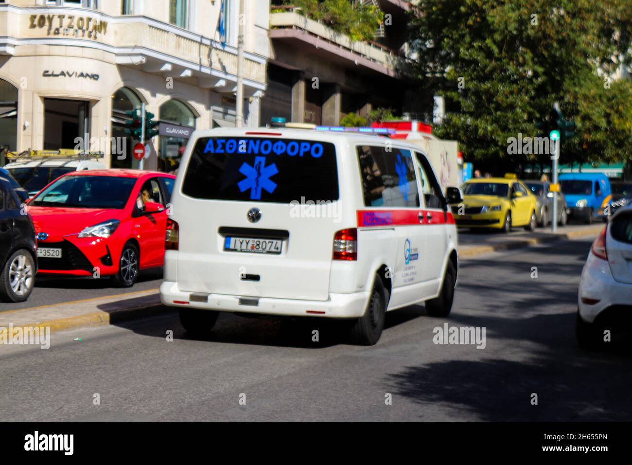 Athens, Greece - November 06, 2021 Greek ambulance driving through the ...