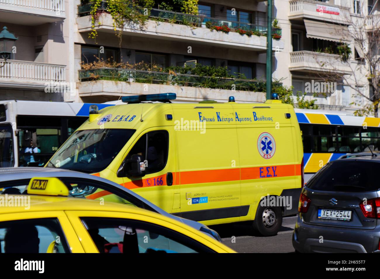Athens, Greece - November 06, 2021 Greek ambulance driving through the ...