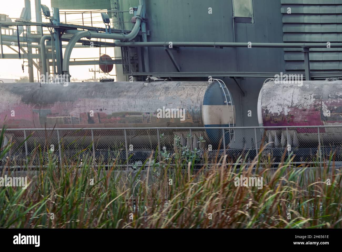Set of tanks with oil and fuel transport by rail. Freight cars and ...