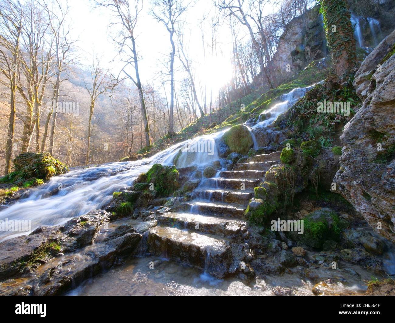 Bad Urach, Germany: The scenic waterfall with flooded stairs in spring ...