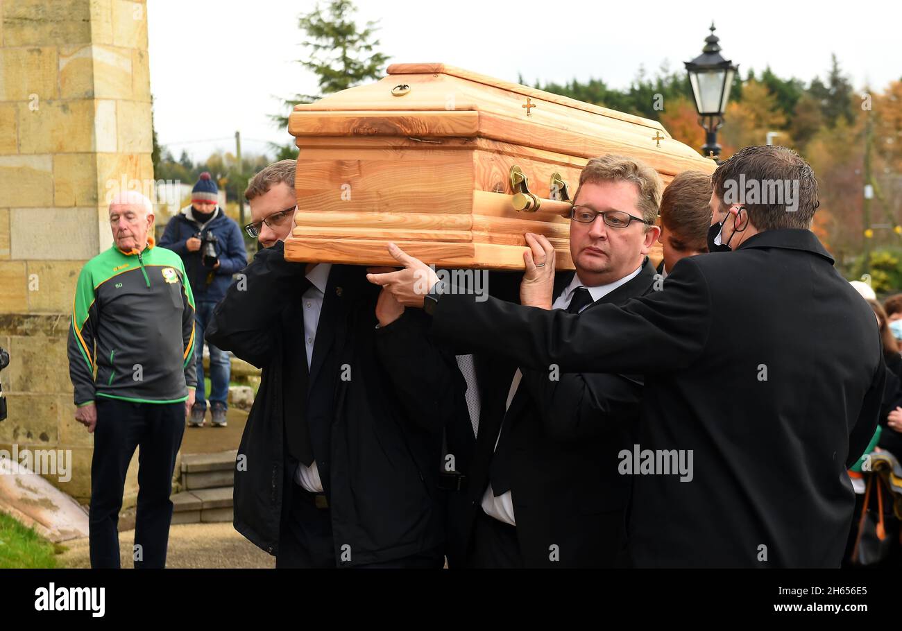 The coffin of civil rights leader Austin Currie is carried to his ...