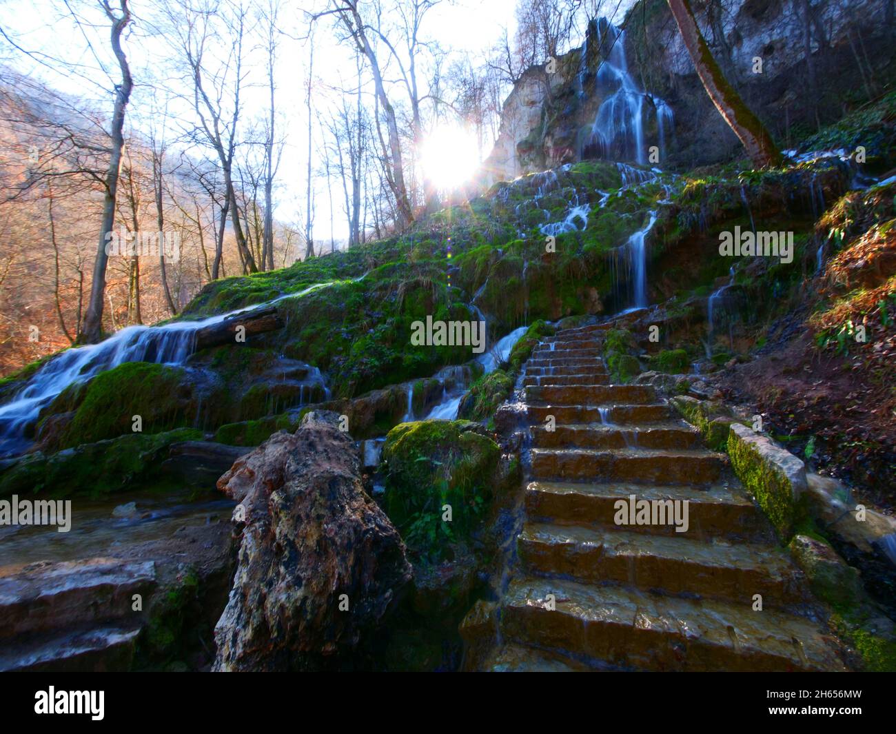 Bad Urach, Germany: The scenic waterfall with flooded stairs in spring ...