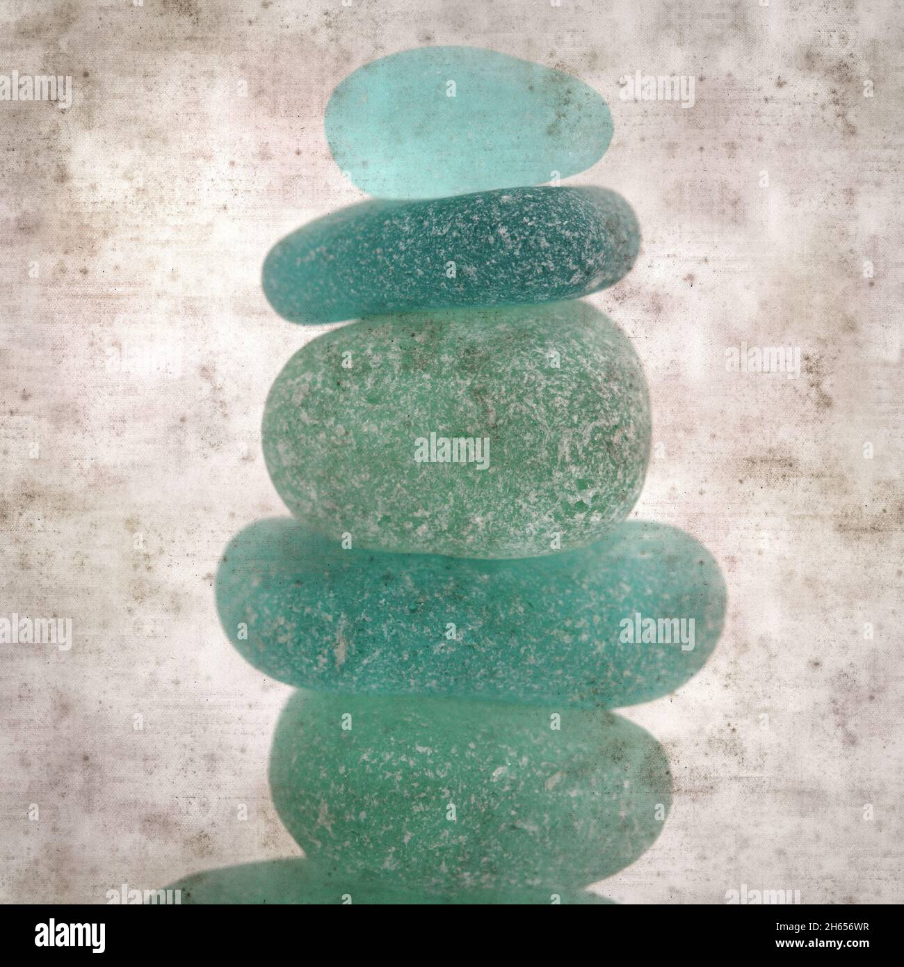 stylish textured old paper background with sea glass pebble pieces ...