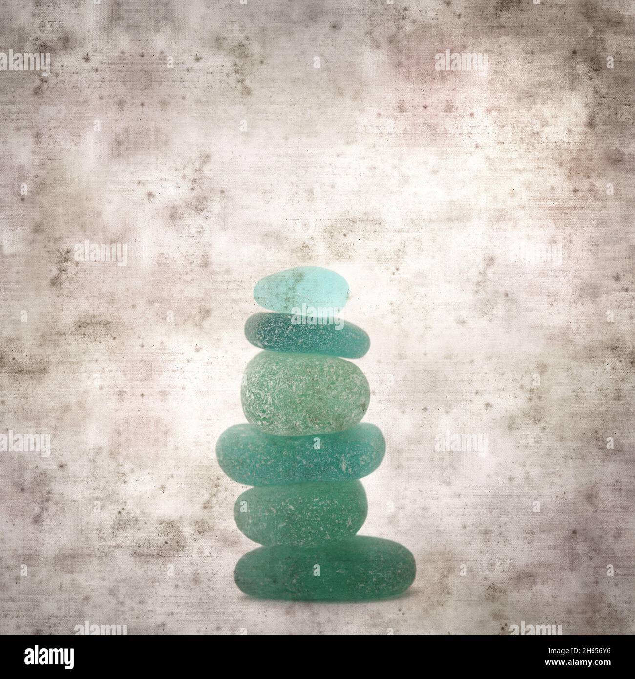 stylish textured old paper background with sea glass pebble pieces ...