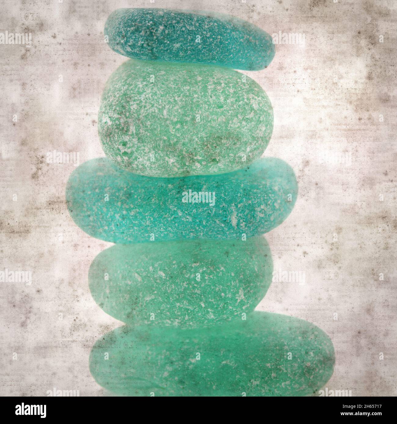 stylish textured old paper background with sea glass pebble pieces ...