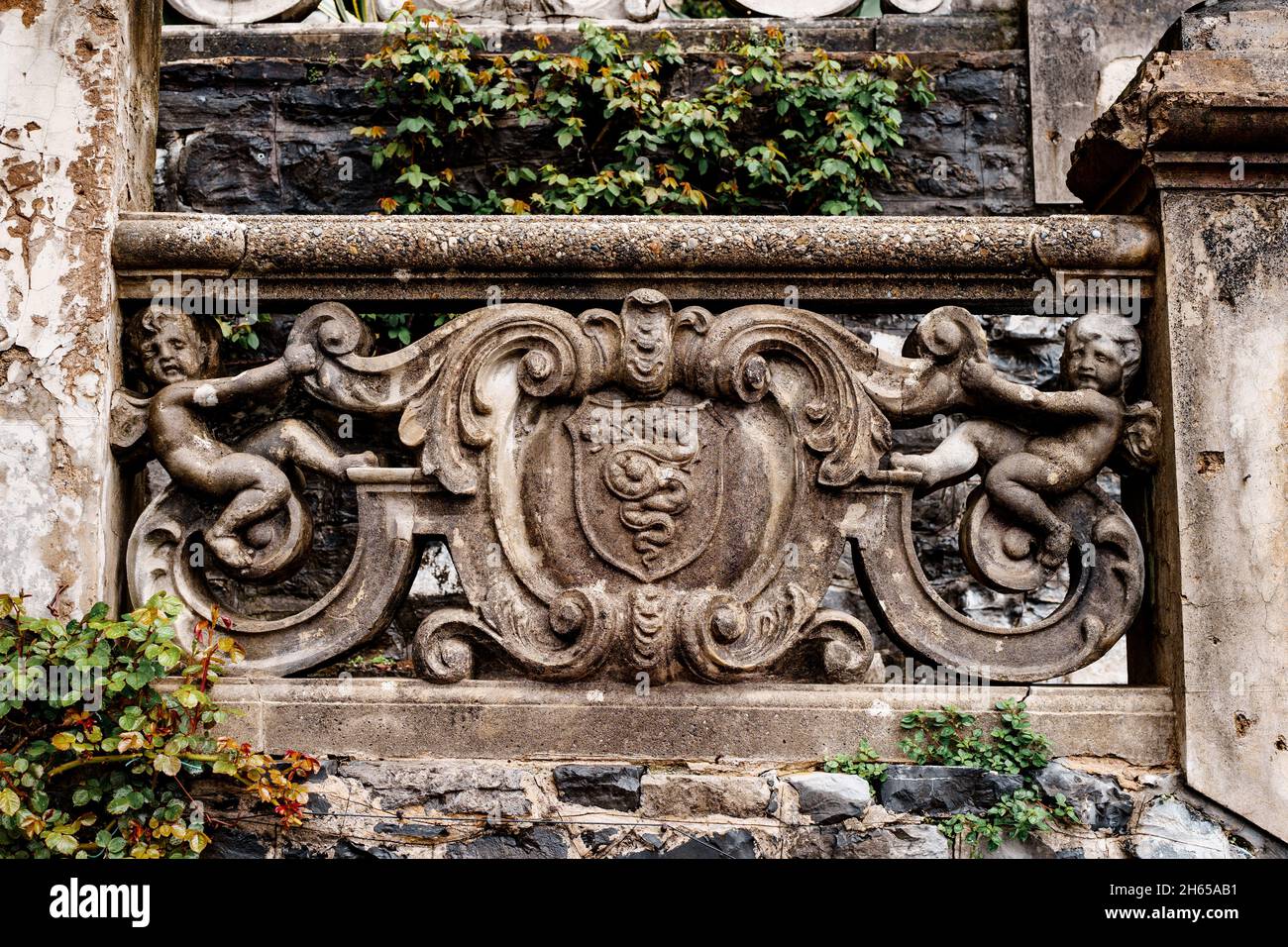 Coat of arms and moldings on the balustrade of the Villa Monastero ...