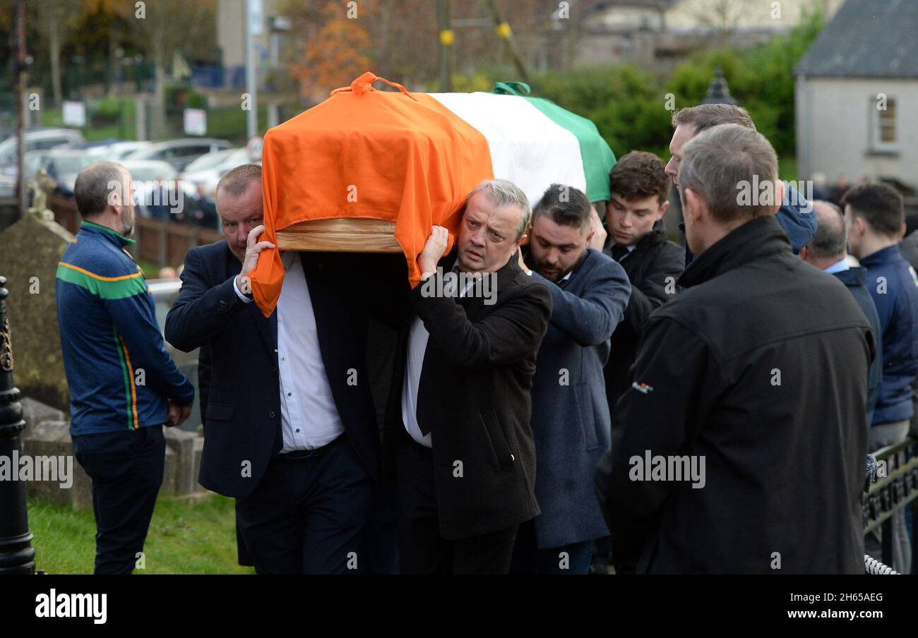 The coffin of civil rights leader Austin Currie is carried to his ...