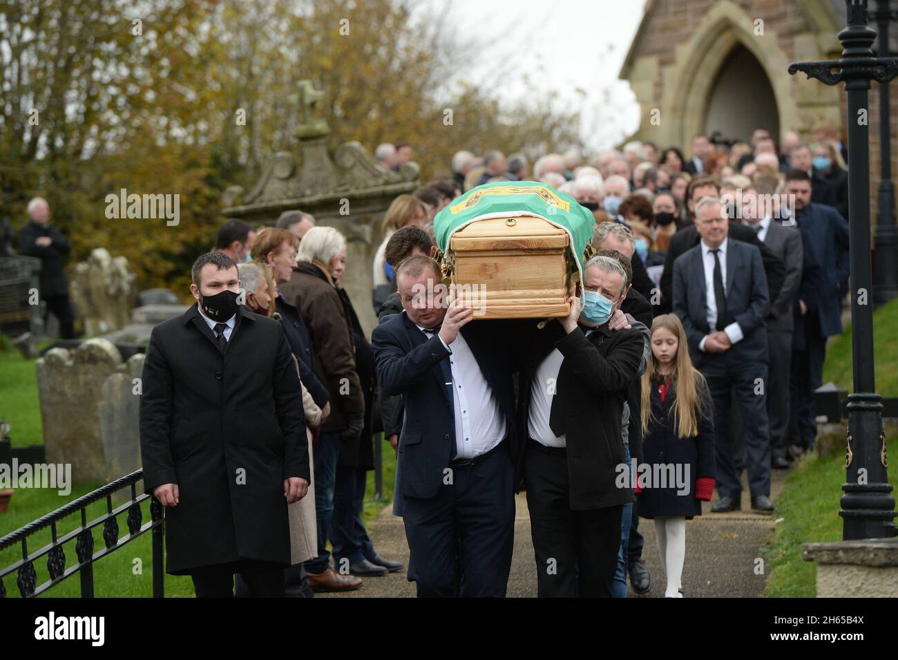Members of Edendork GAA club carry the coffin of civil rights leader ...