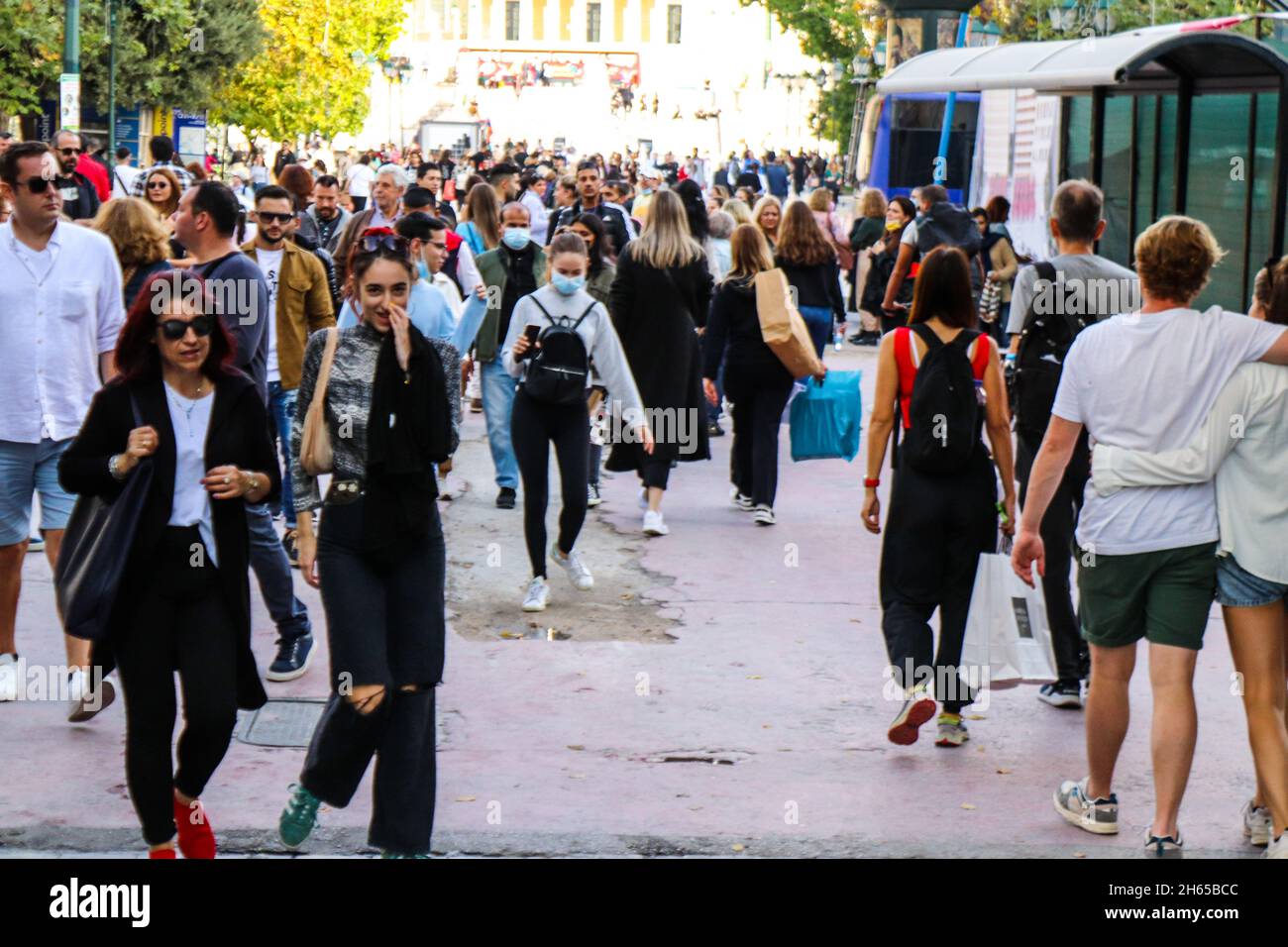 Athens, Greece - November 07, 2021 Crowd people walking and shopping at ...