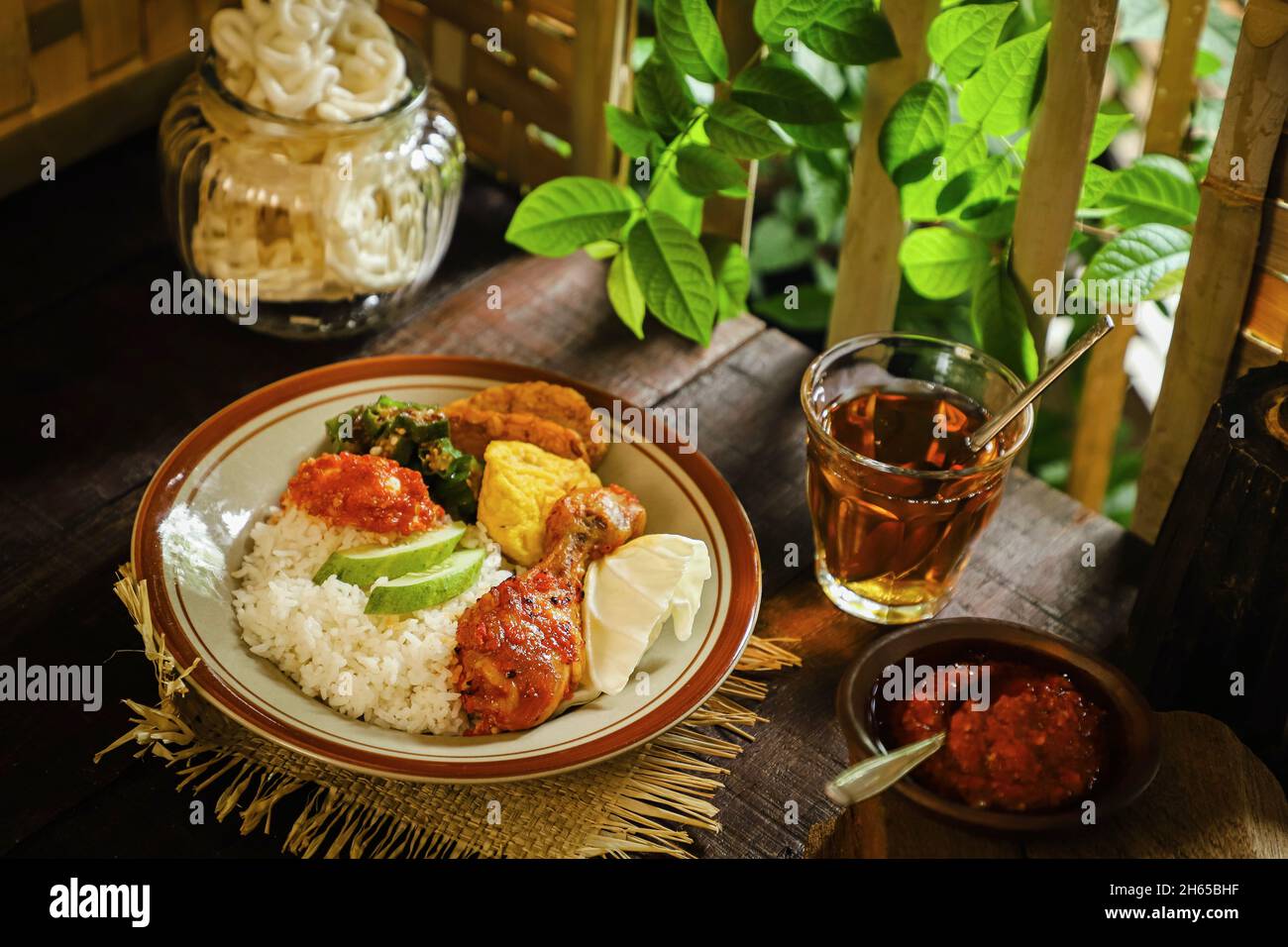 Nasi Campur. Indonesian meal of rice with variety of side dishes ...
