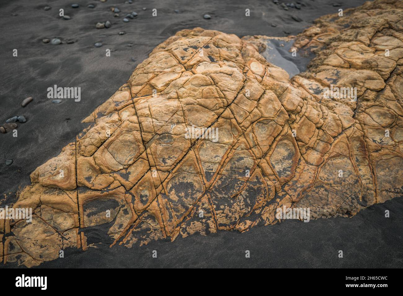 Magnetic black sand on the beach, New Zealand Stock Photo - Alamy
