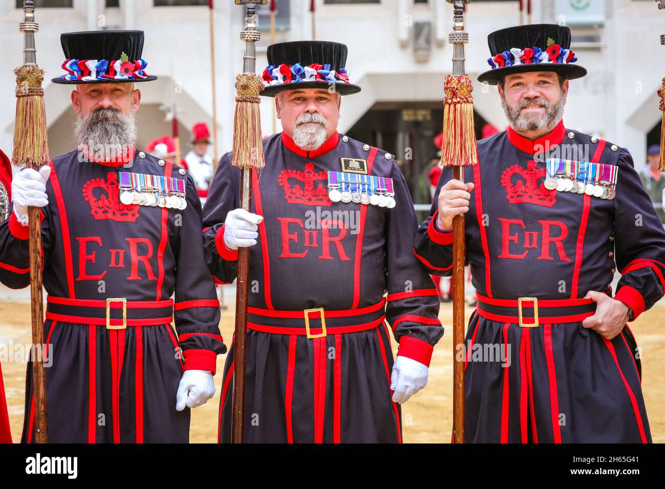 Three Yeoman Warders, in their traditional prepare for the start of the ...