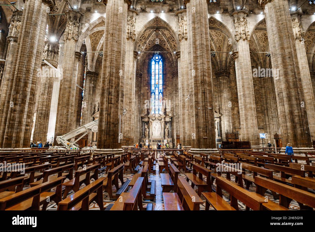 Rows of seats against the backdrop of columns in the Duomo. Italy ...
