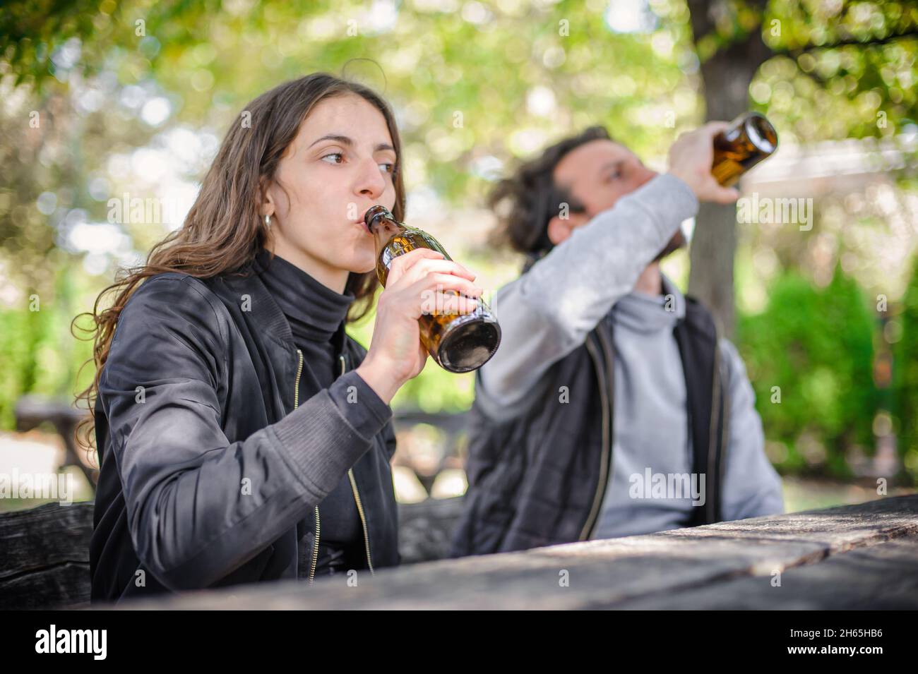 Alcohol drink park bench hi-res stock photography and images - Alamy