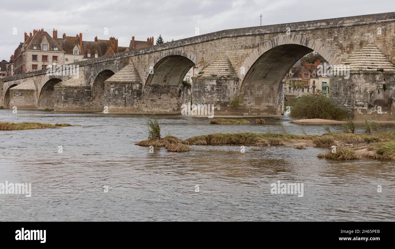 Old stone bridge crossing the river Loire into a town Stock Photo - Alamy