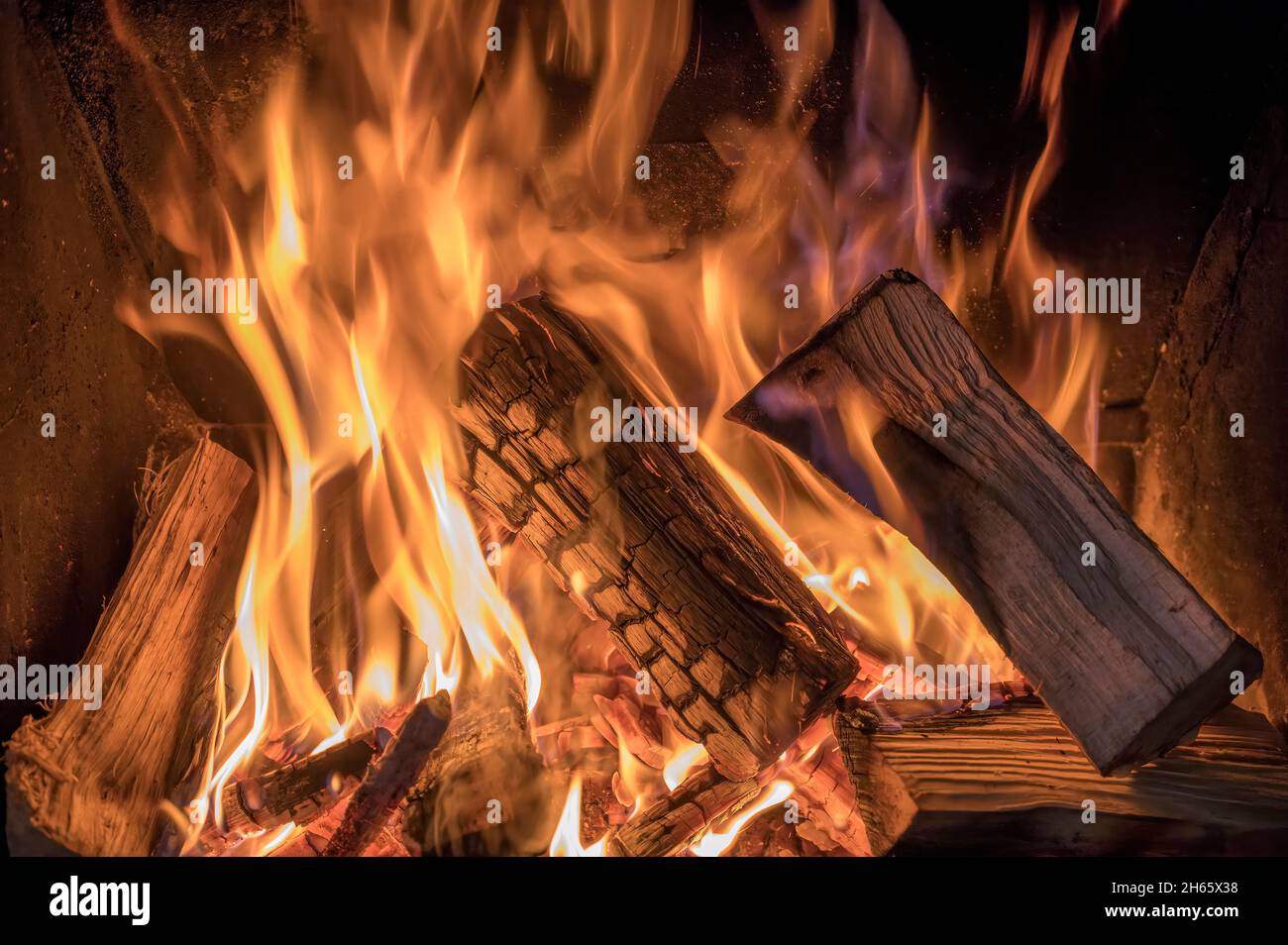 Nothing like a real log fire Stock Photo - Alamy
