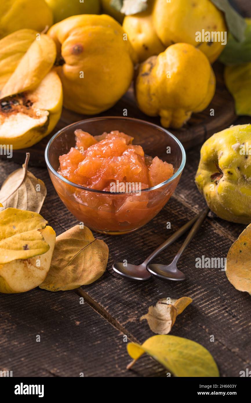 Ripe whole quince and sweet jam from it. Fresh fruit, an essential ...