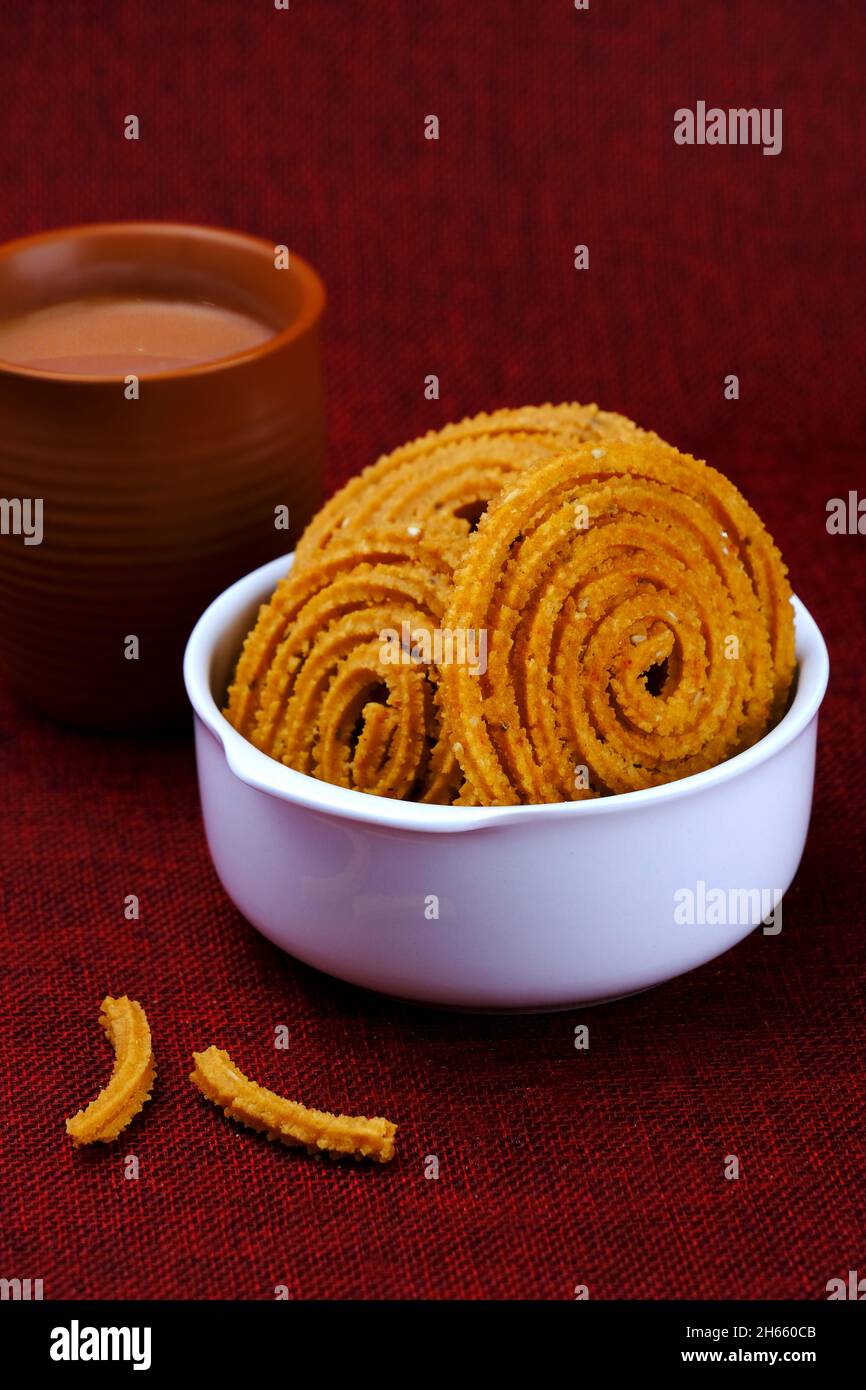 Indian Traditional Snack Chakli, a spiral shaped, Chakali or murukku ...