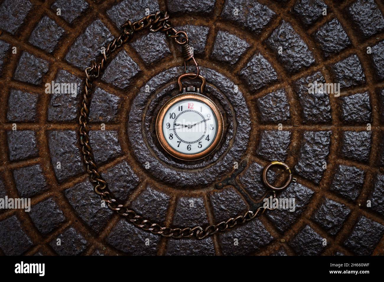 Pocket watch on metal texture background. Time concept. Retro clock ...