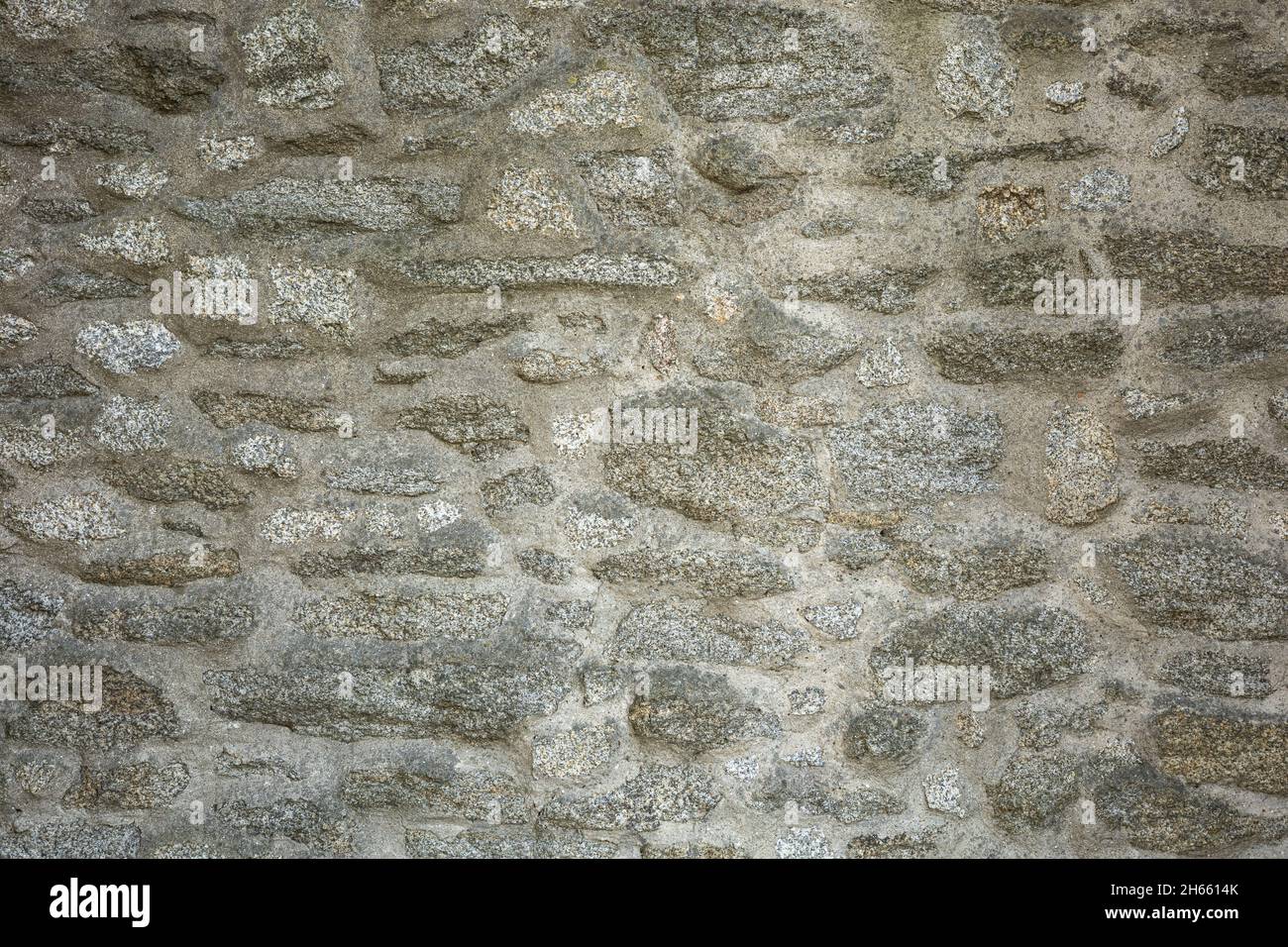 A light grey, medieval stone wall background with copy space Stock ...
