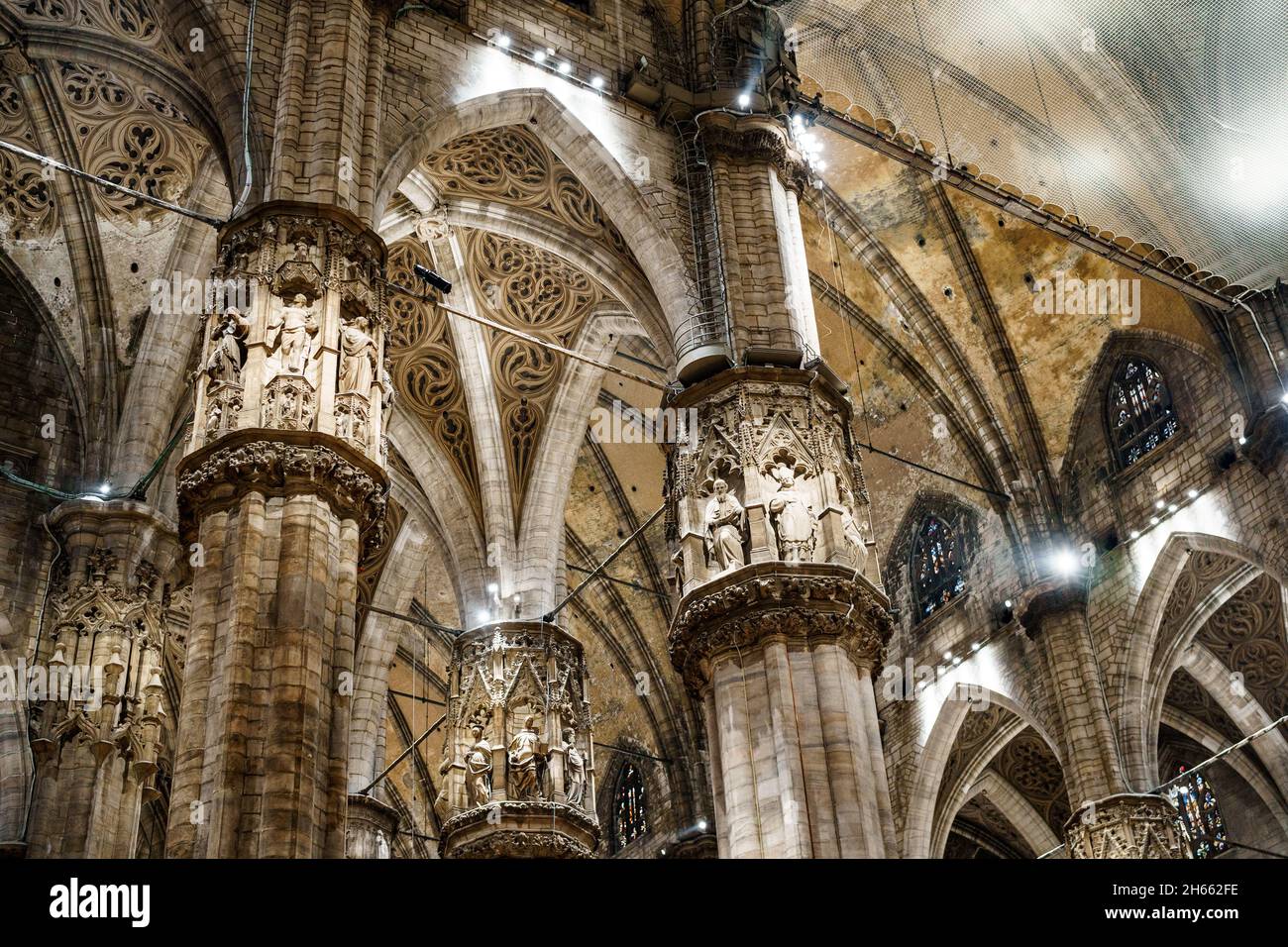 Bright lighting of the marble vaulted ceiling of the Duomo. Italy ...