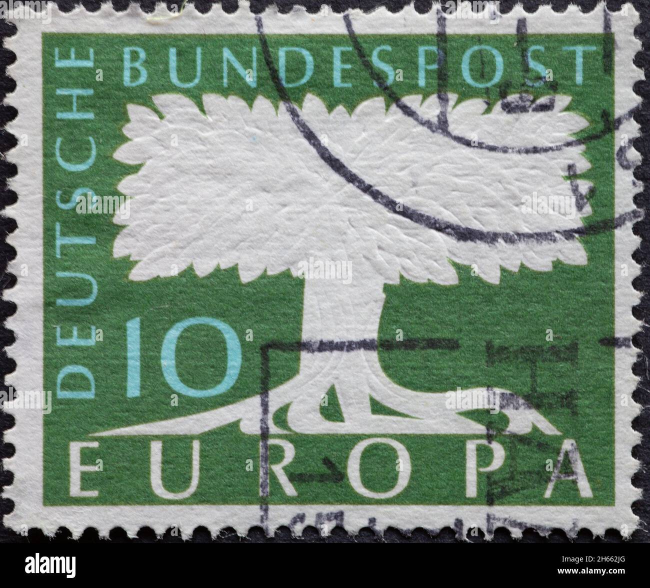 GERMANY - CIRCA 1957: This postage stamp shows a white tree embossed on ...