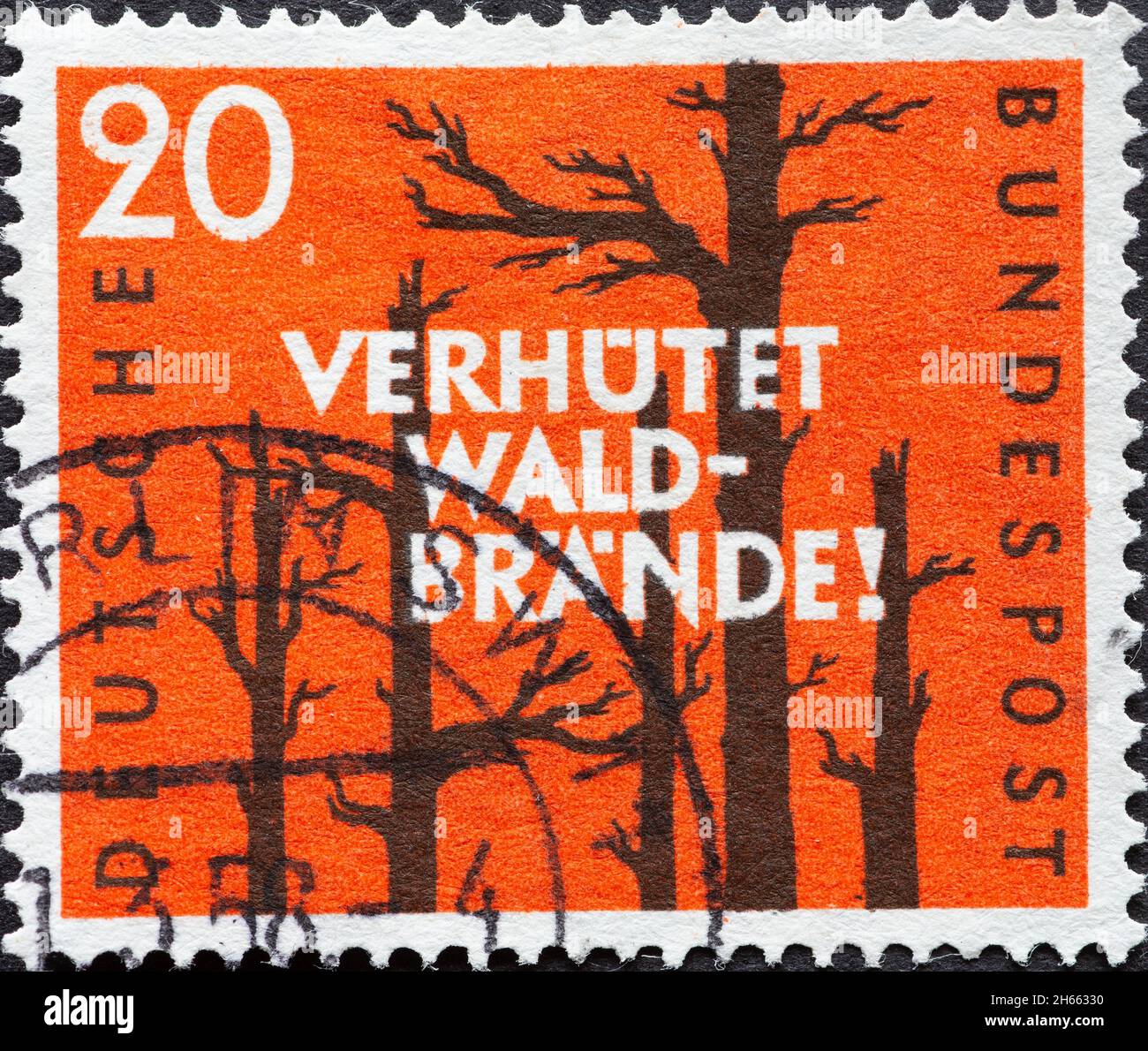 GERMANY - CIRCA 1958: This postage stamp shows the silhouette of burned ...