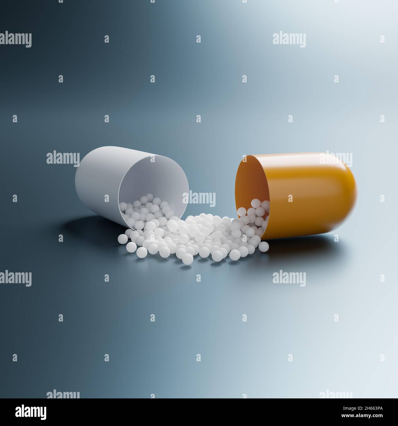 An open pill capsule spilling the active ingredient Stock Photo - Alamy