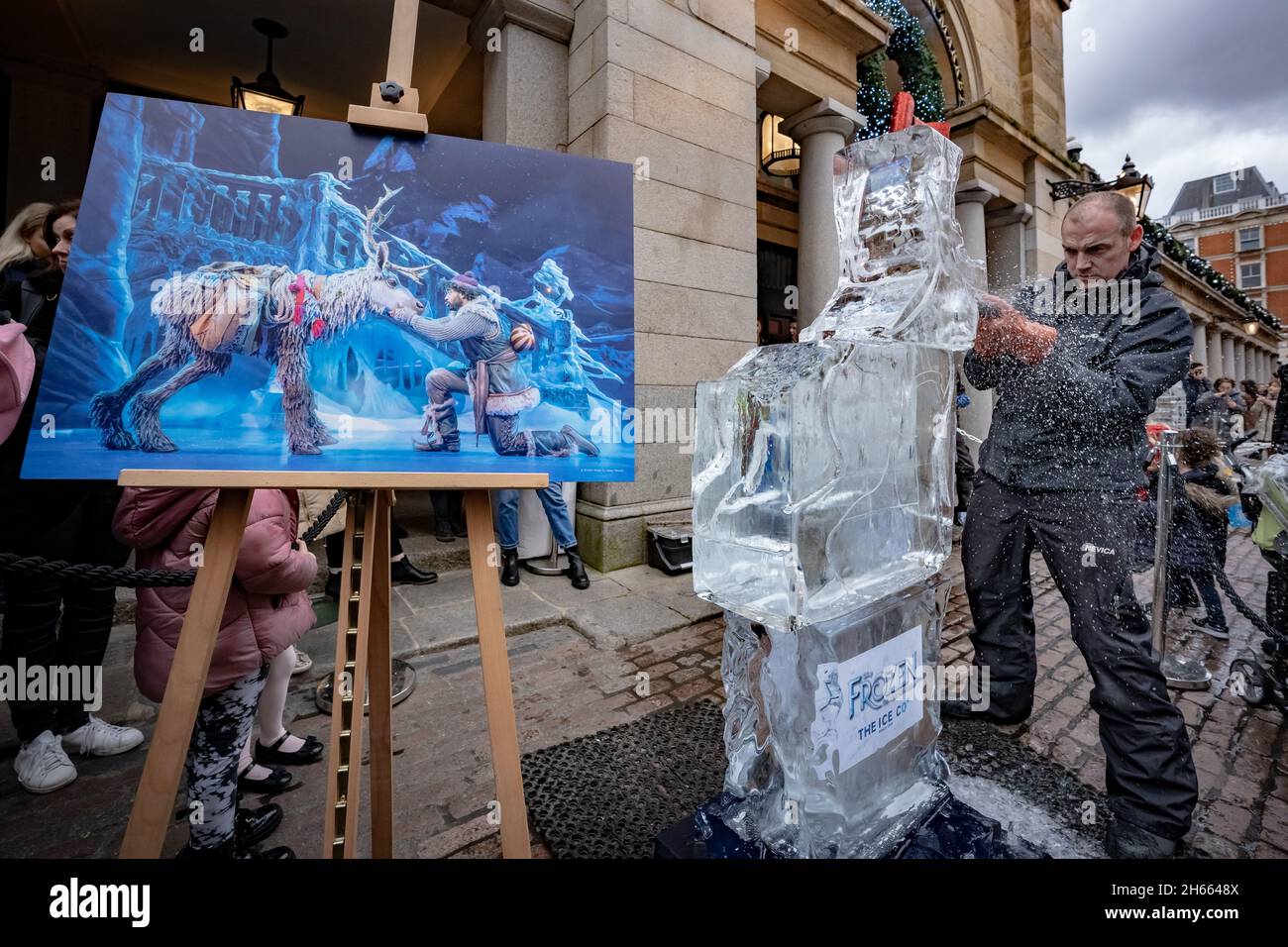 Live ice carving sculpture of Sven character from the West End Disney ...