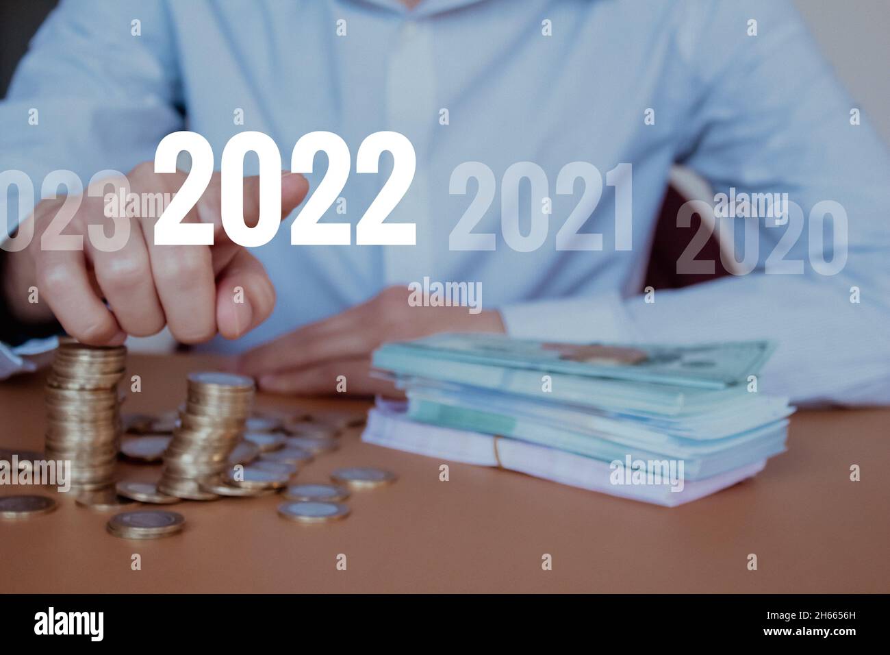 Businessman selects year 2022. New year 2022 coming concept. Hand ...