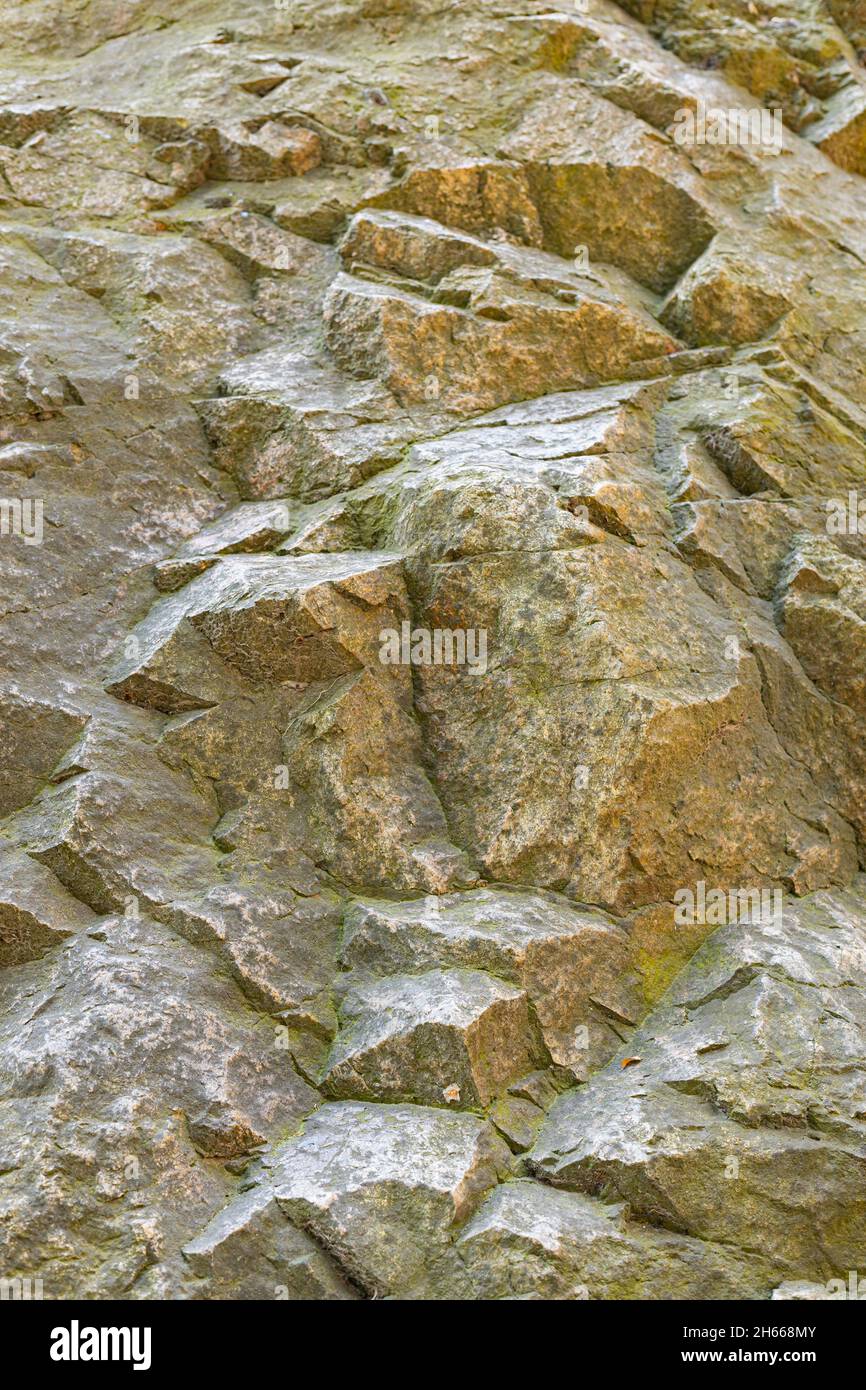 Cracks in the granite rock due to human activity. Destruction of the ...