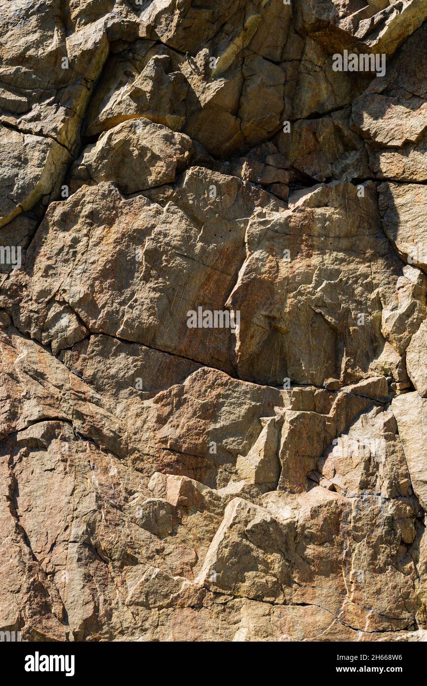Cracks in the granite rock due to human activity. Destruction of the ...