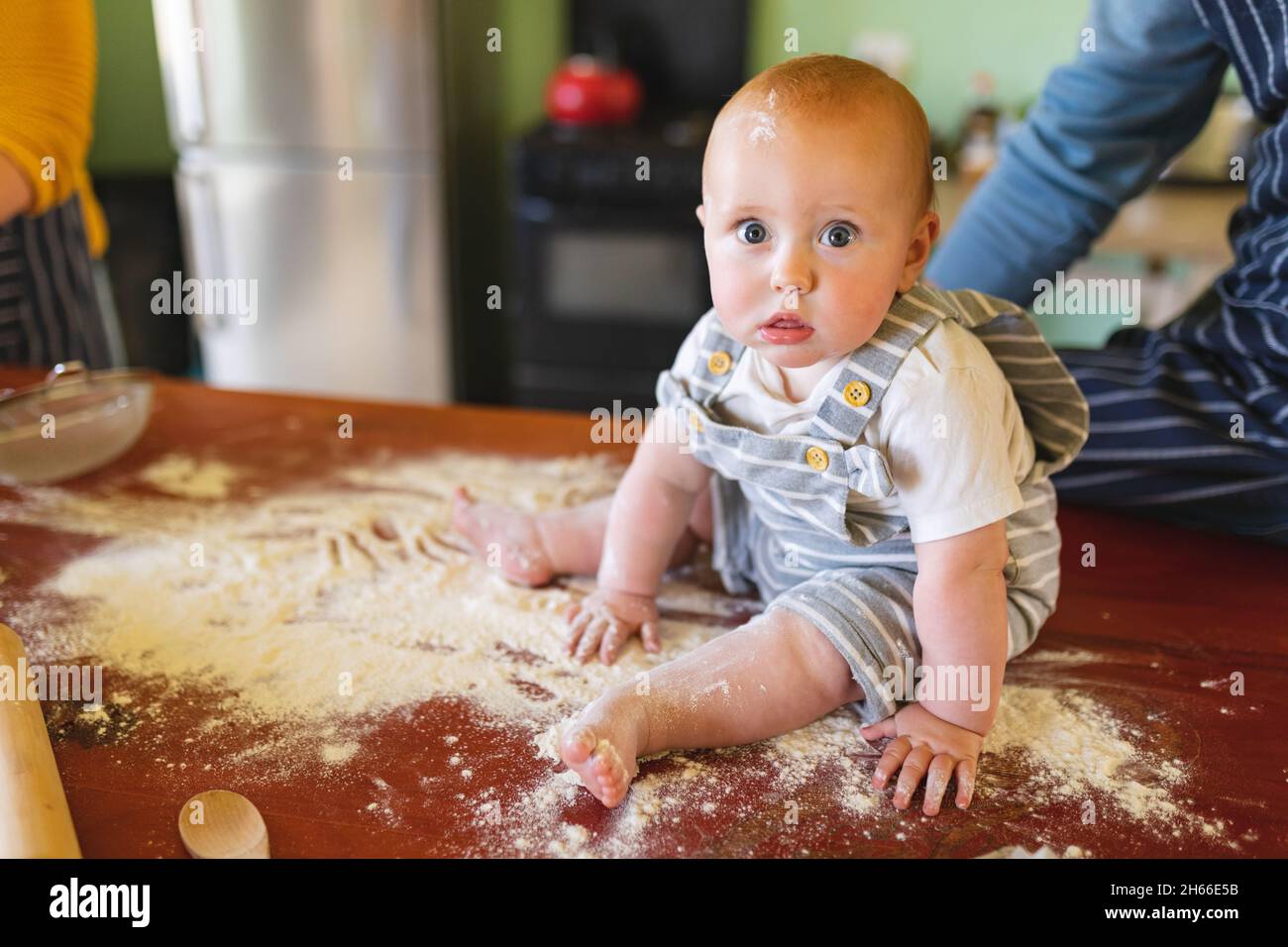 Young parents playing baby son hi-res stock photography and images - Alamy