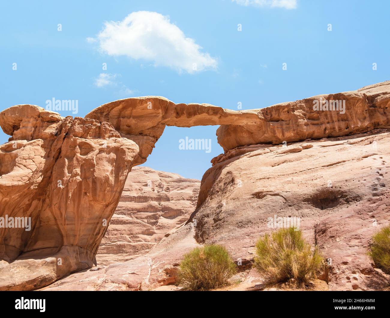 Um Frouth Rock Bridge, a high natural rock bridge in Wadi Rum desert ...