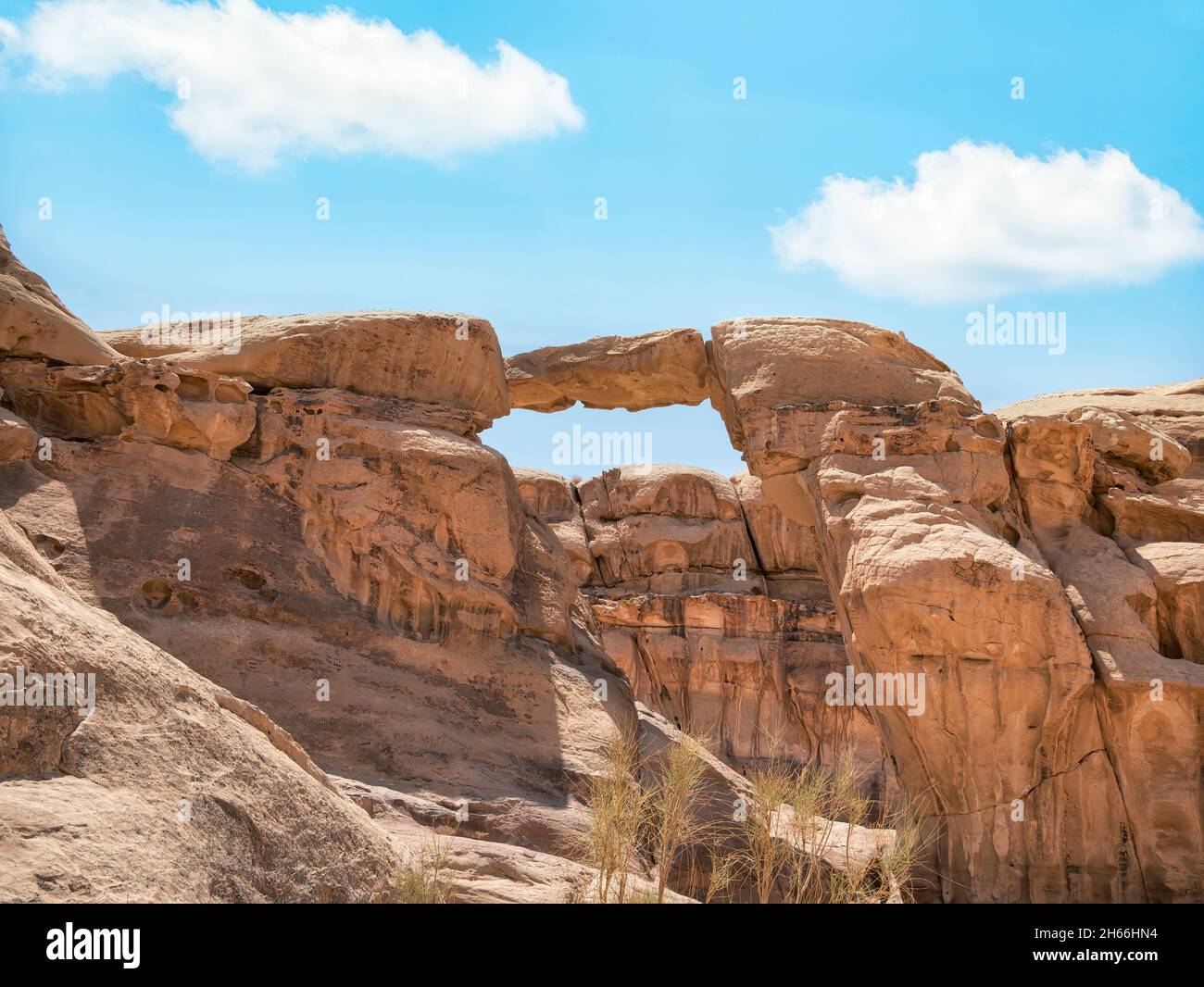 Um Frouth Rock Bridge, a high natural rock bridge in Wadi Rum desert ...