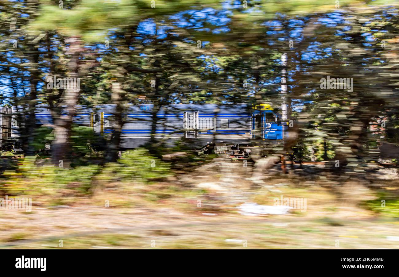 Long Island Railroad train moving quickly through Napeague stretch ...