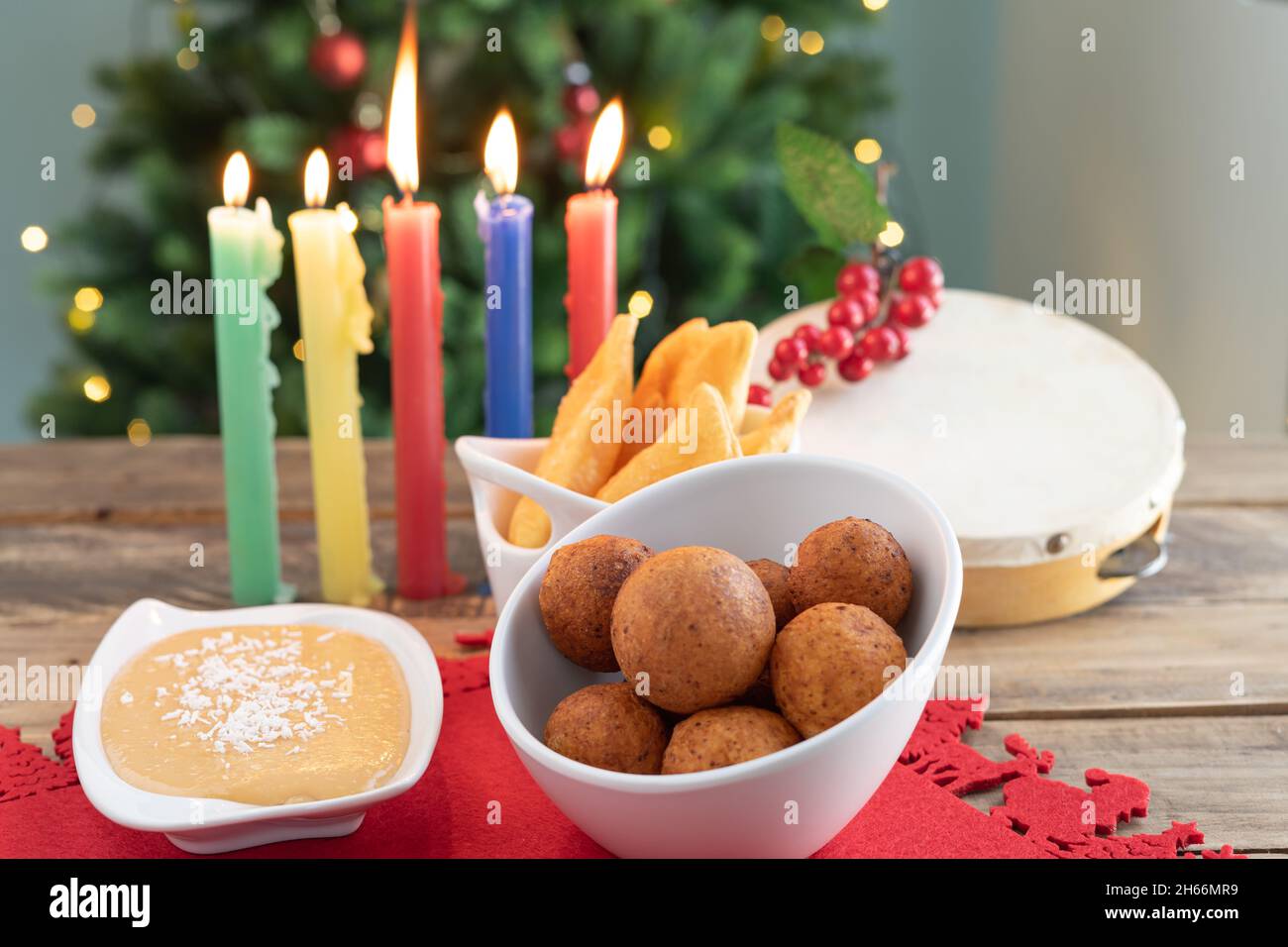 Candlelight Day. Typical Colombian food. Buñuelo, custard and flakes ...