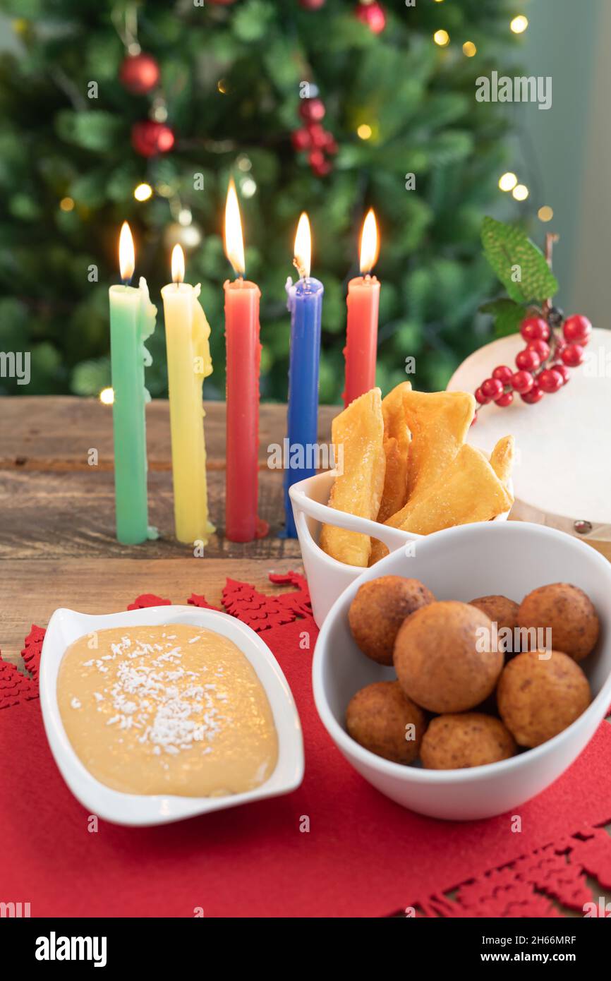 Candlelight Day. Typical Colombian food. Buñuelo, custard and flakes ...
