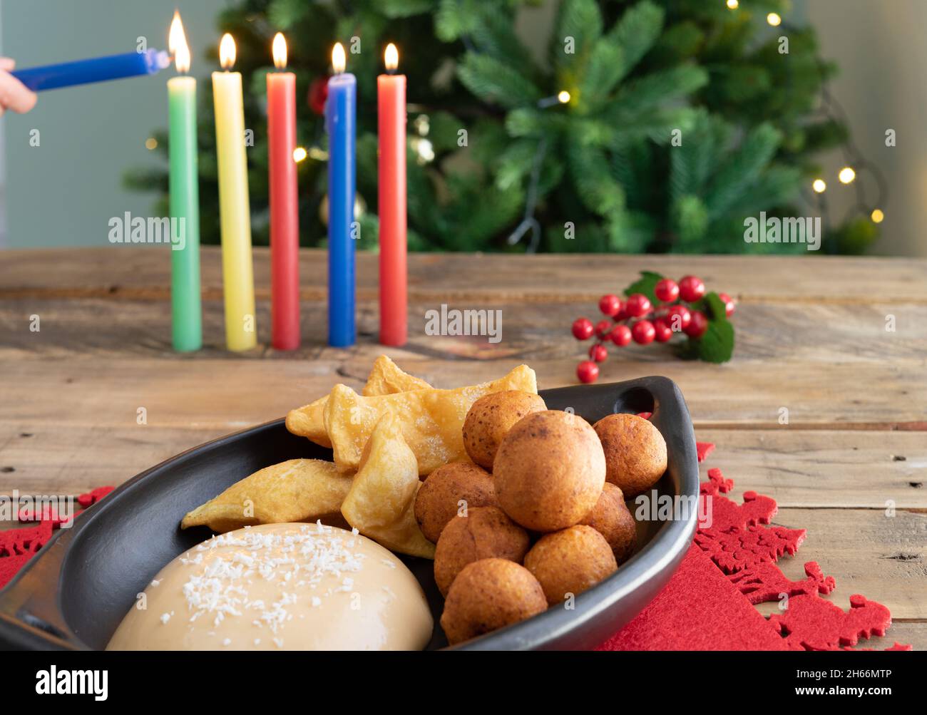 Candlelight Day. Typical Colombian food. Buñuelo, custard and flakes ...