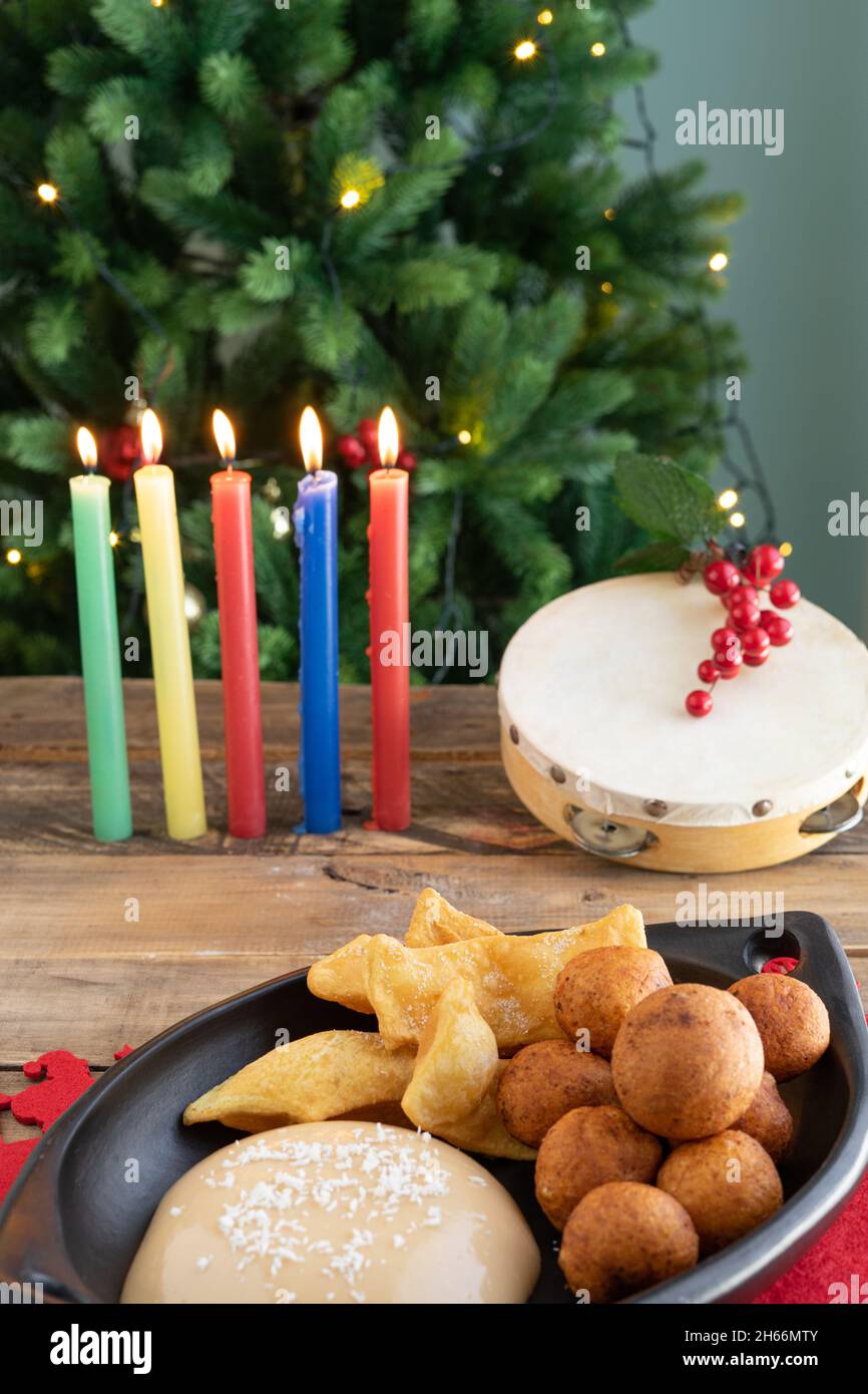 Candlelight Day. Typical Colombian food. Buñuelo, custard and flakes ...