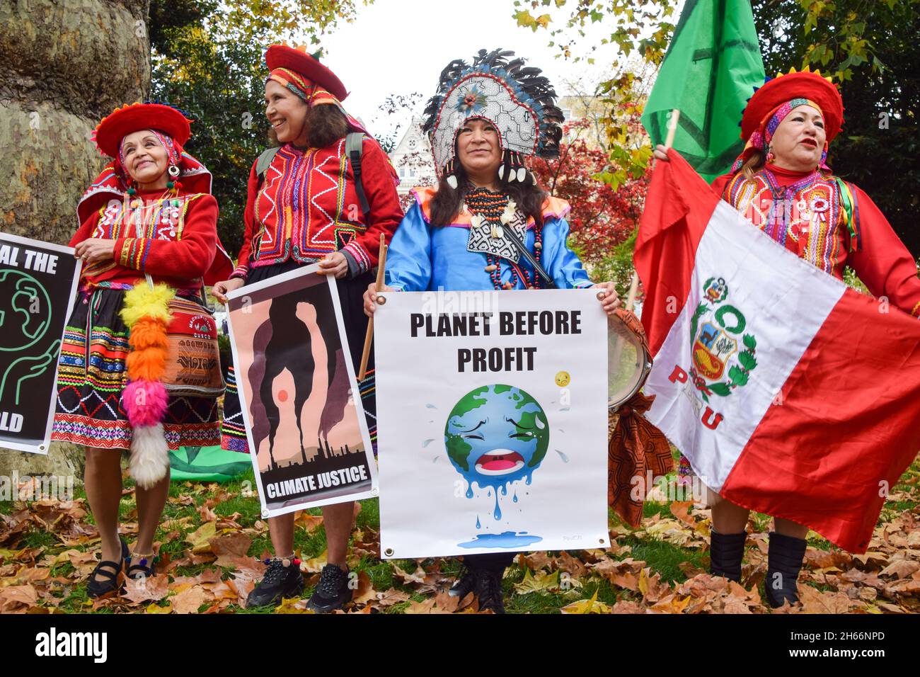 London, UK. 13th Nov, 2021. Demonstrators dressed in indigenous ...