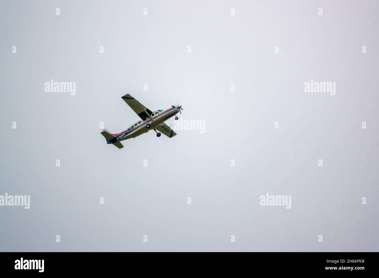 Cessna 208b Grand Caravan G-BZAH light aircraft ascends from the ...