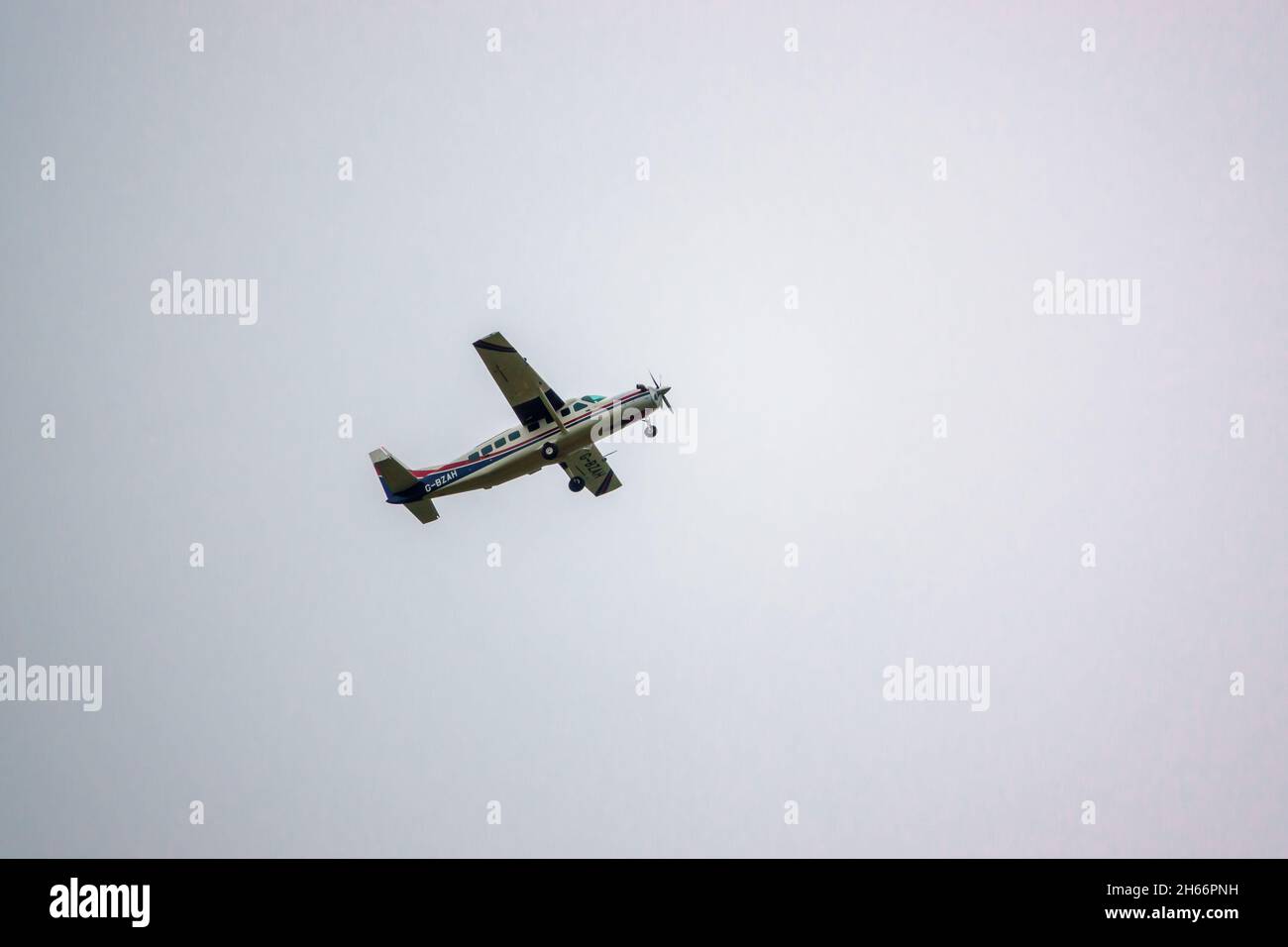 Cessna 208b Grand Caravan G-BZAH light aircraft ascends from the ...