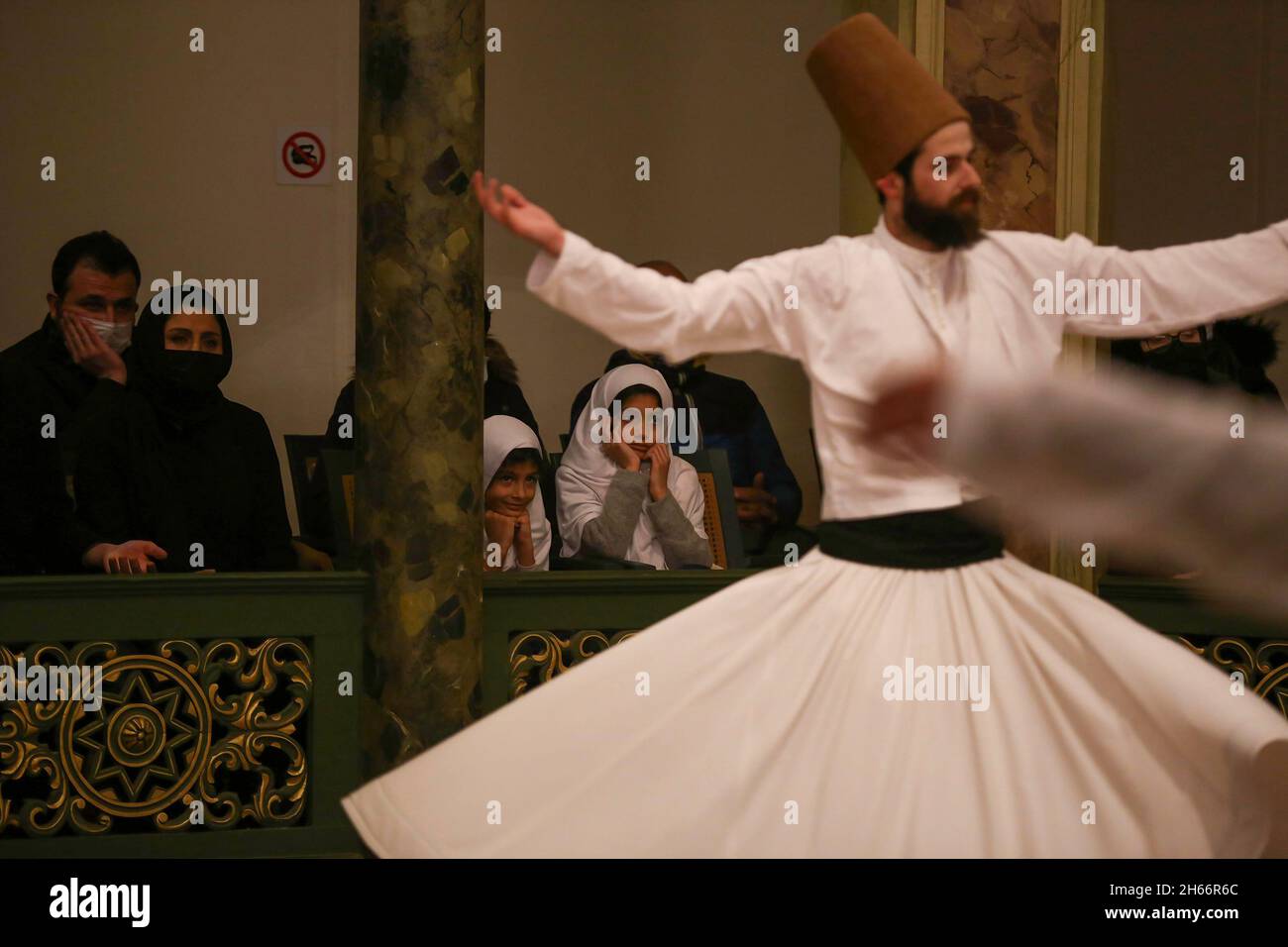 A devotee seen during the ceremony. Whirling dervishes perform the ...