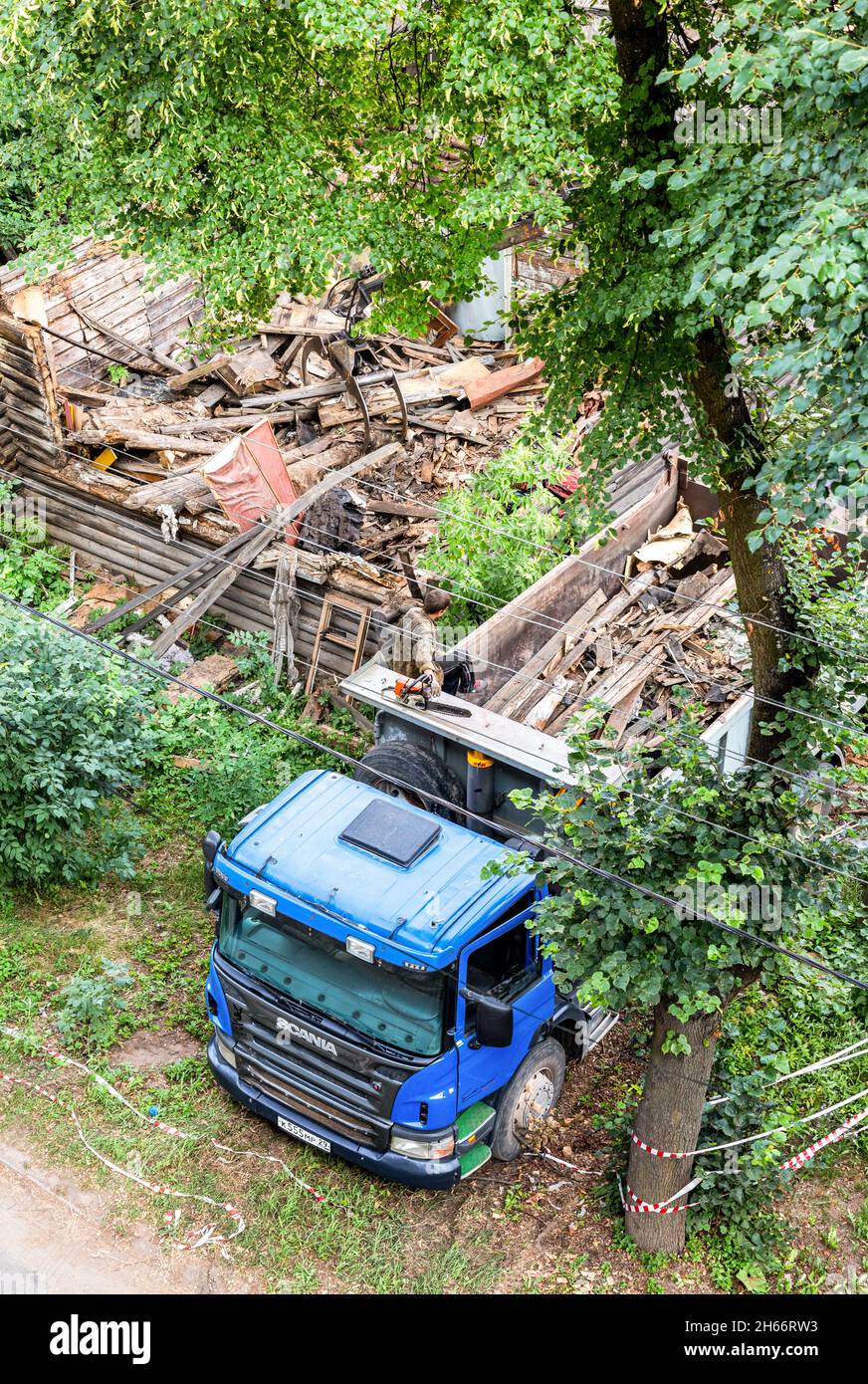 Novgorod, Russia - July 2, 2021: Demolition of an old wooden house ...