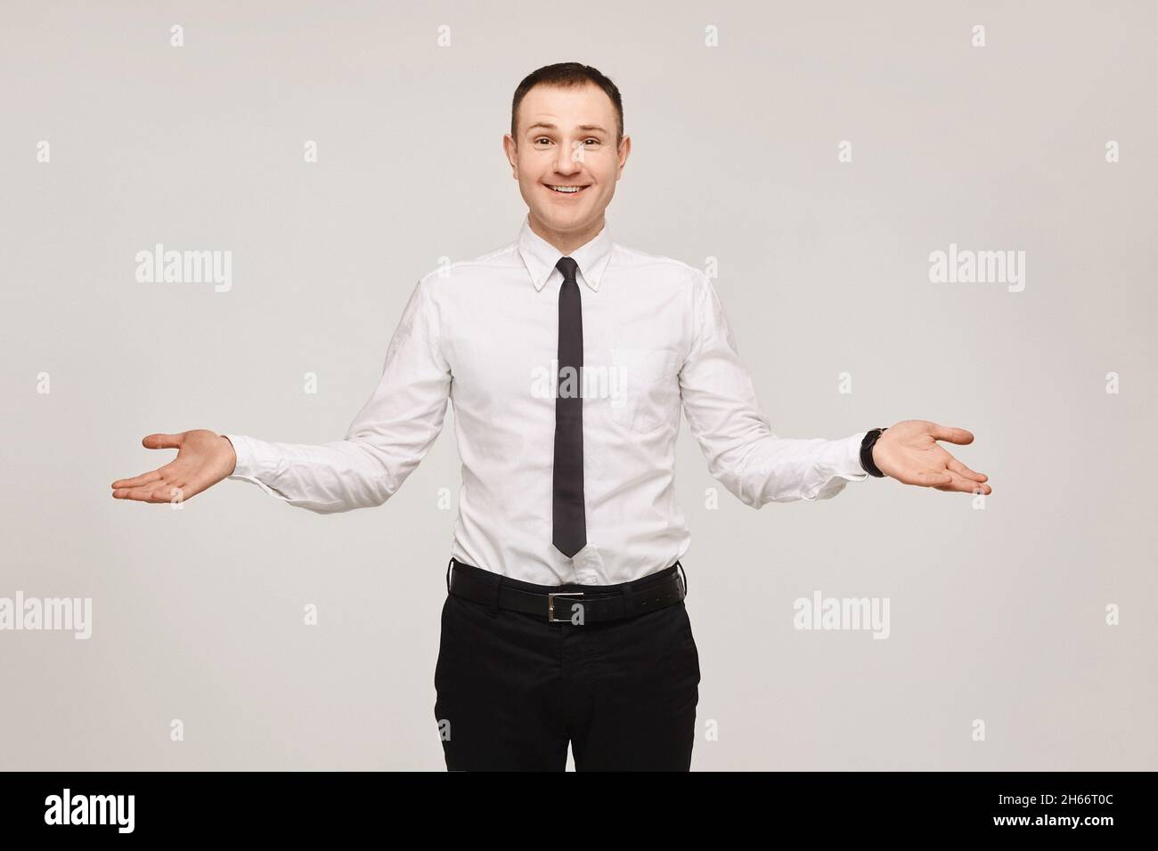 Businessperson spread arms office hi-res stock photography and images ...