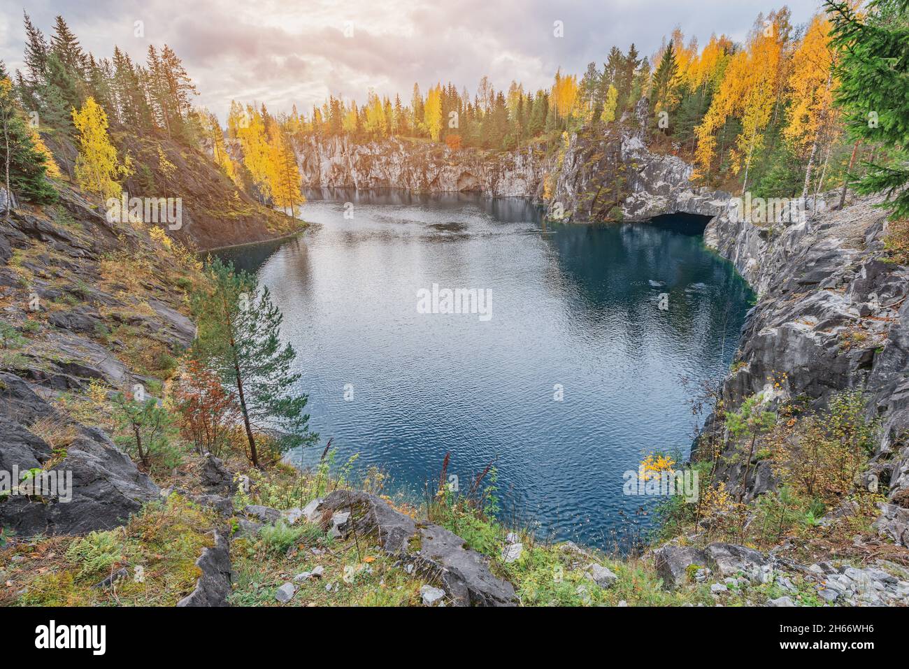 Lake in the deep marble canyon. Ruskeala Mountain Park at sunset ...