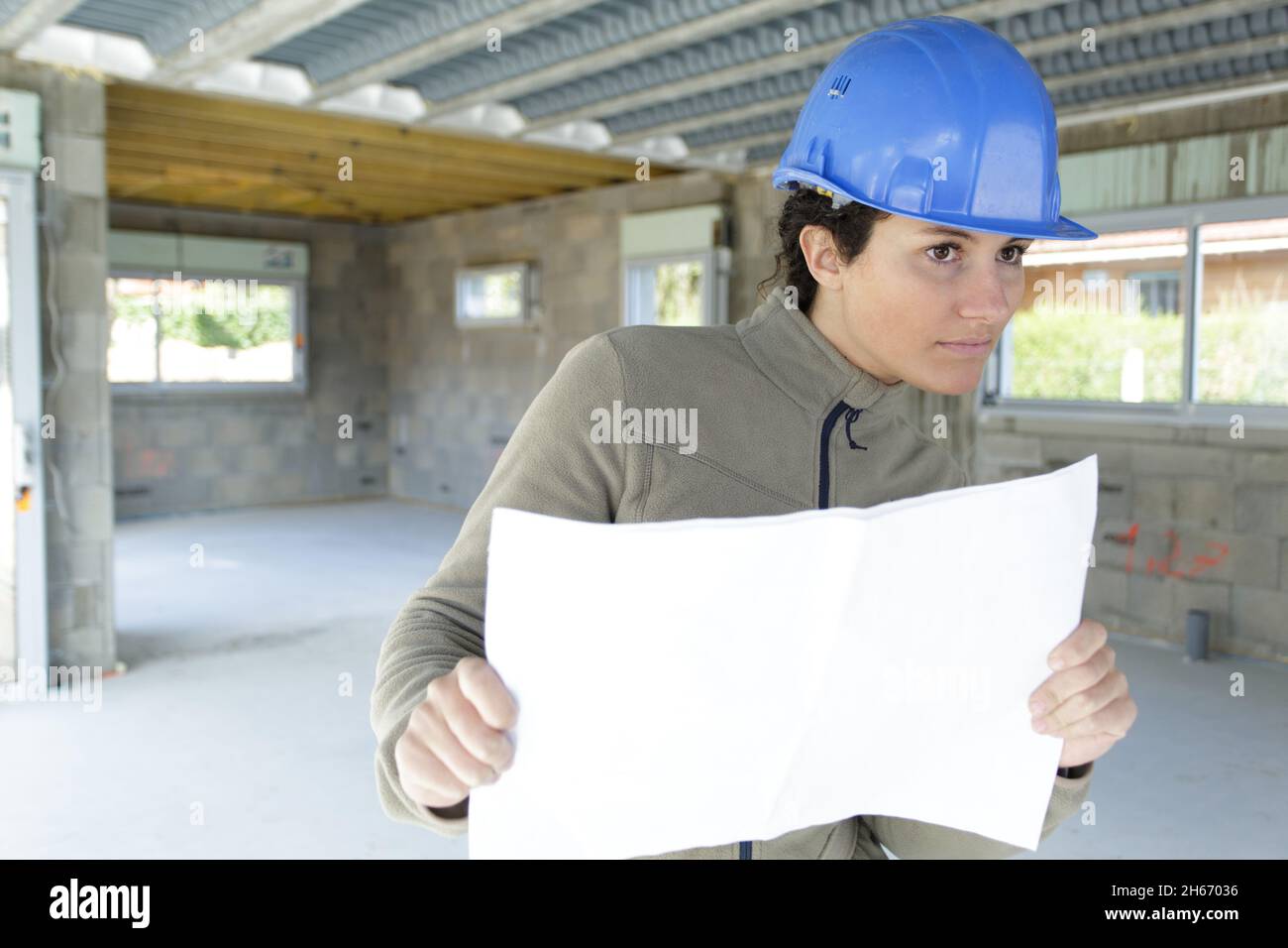 Architect wearing work helmet writing hi-res stock photography and ...