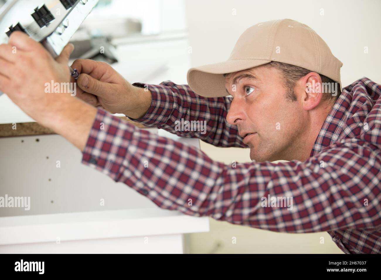 Induction cooking male hi-res stock photography and images - Alamy