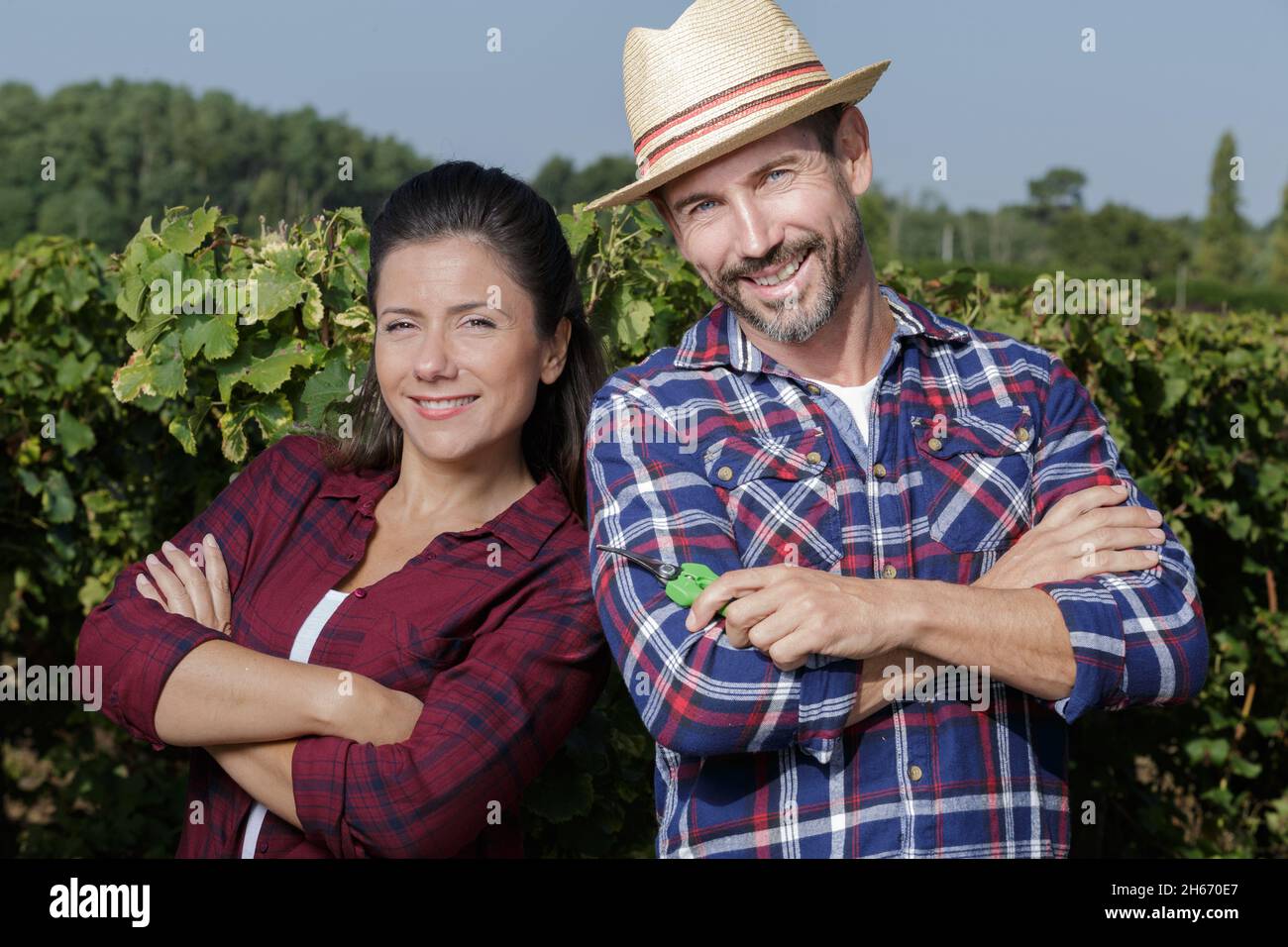 couple of farmers after gathering harvest Stock Photo - Alamy